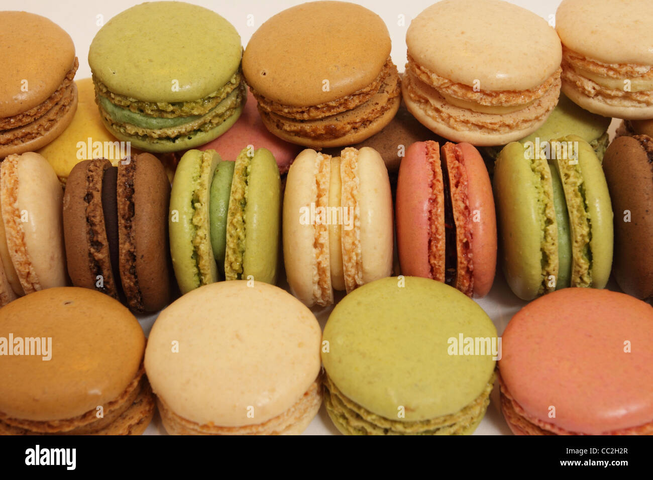 assortment of macaroons on a white background Stock Photo - Alamy