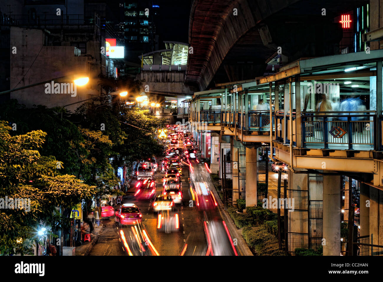 Traffic jam on Silom Road, Bangkok seen from the walkway linking the ...