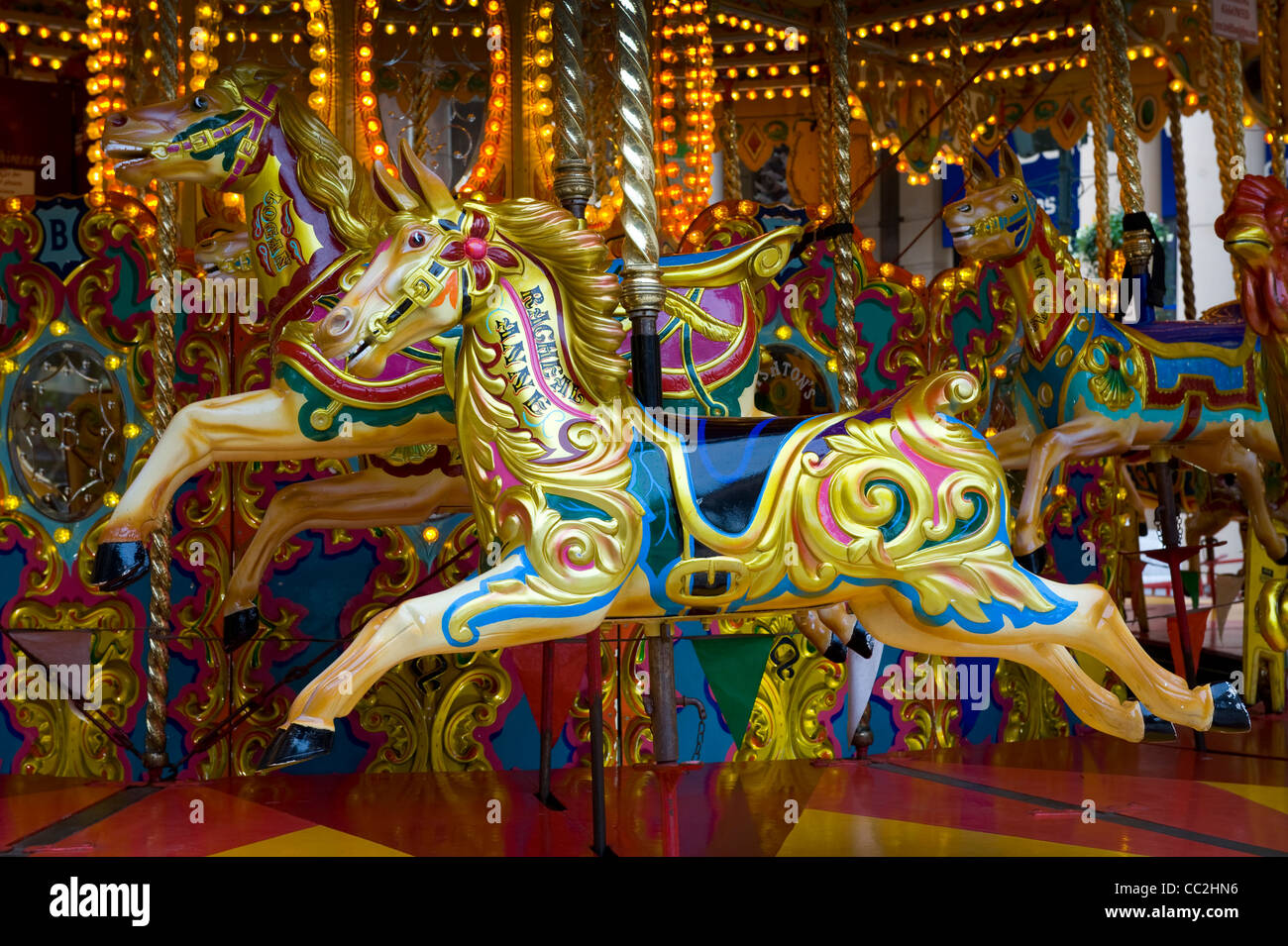 Horse rides on a traditional victorian carousel Stock Photo - Alamy