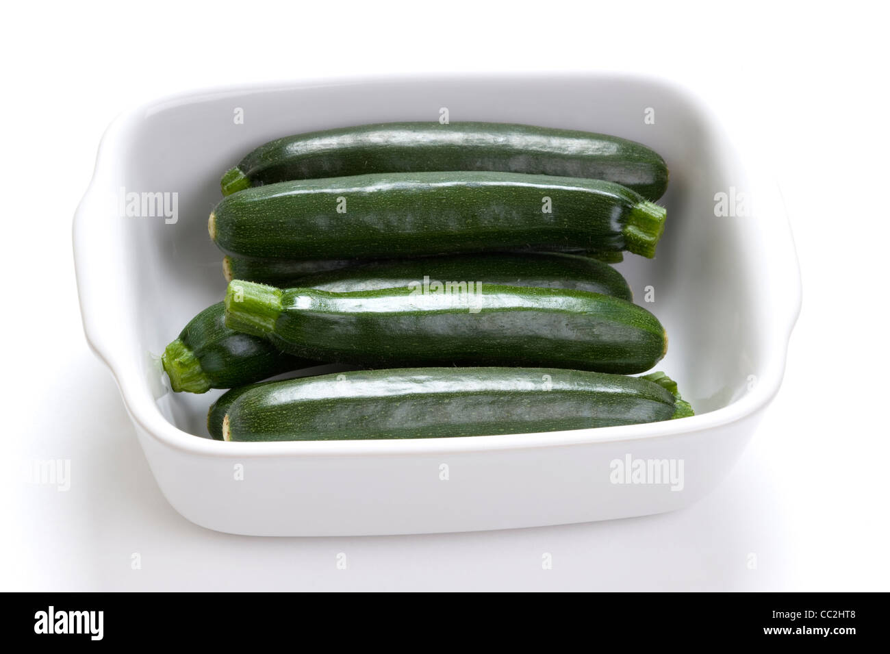 courgette or zucchini isolated on a white studio background Stock Photo ...