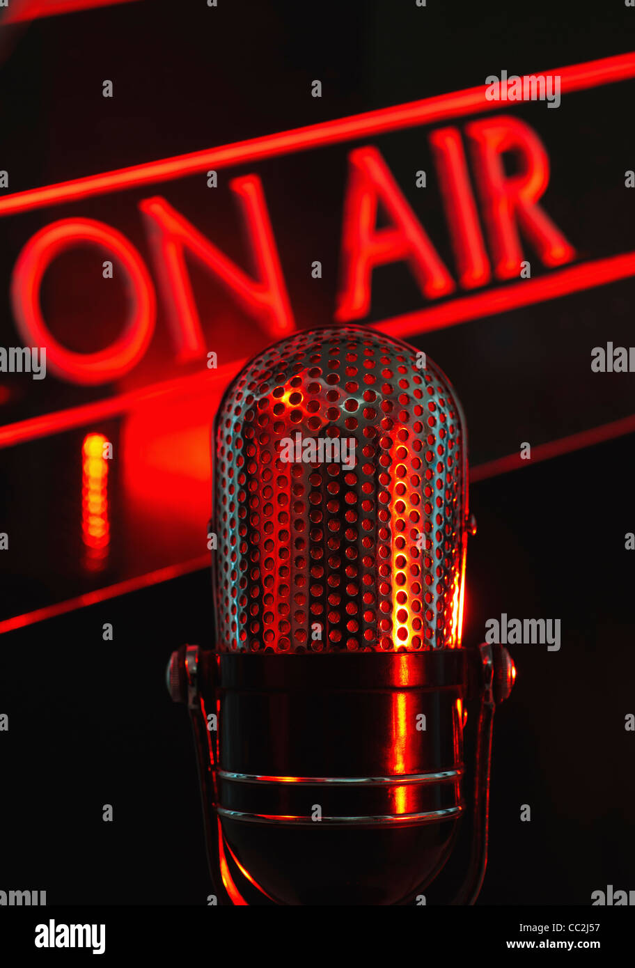 Vintage microphone and red on air neon, studio shot Stock Photo - Alamy