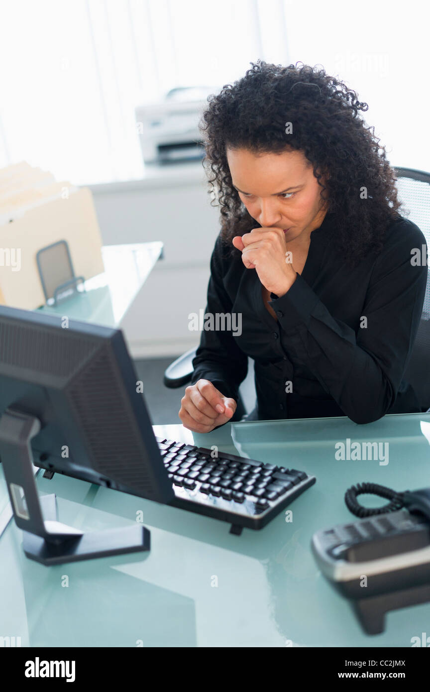 USA, New Jersey, Jersey City, Business woman using computer Stock Photo ...
