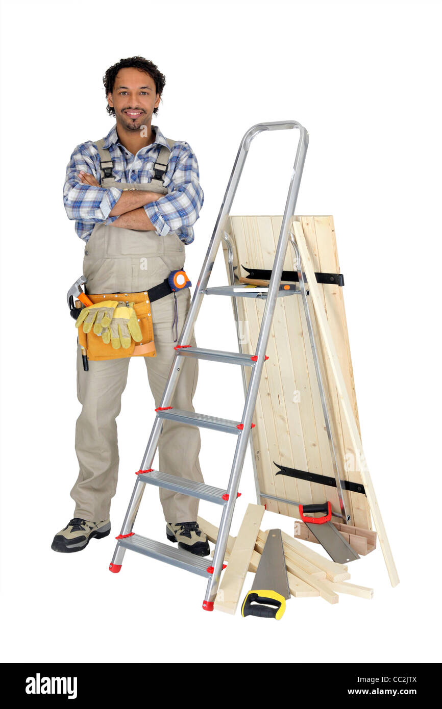 Man building a gate Stock Photo - Alamy