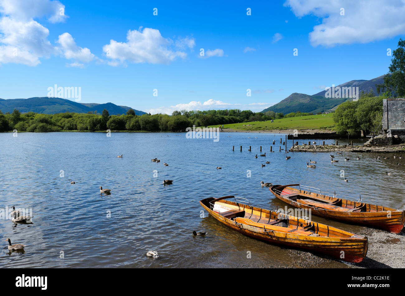 Rowing boat at side of Derwent Water in Lake District National Park ...