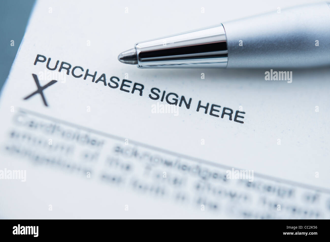 Detail of document with ballpoint pen, studio shot Stock Photo - Alamy