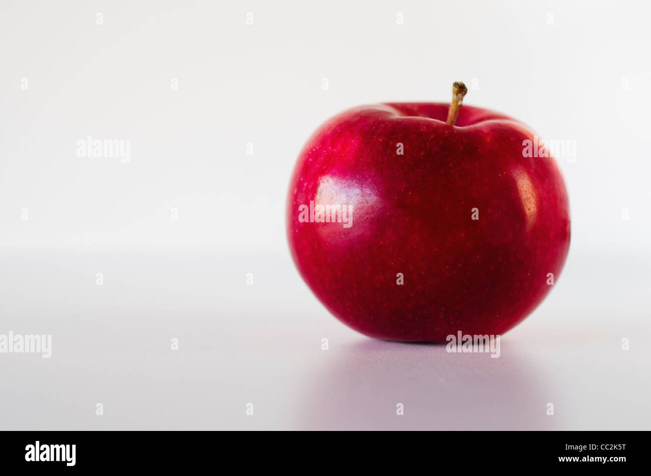 Red apple on white background Stock Photo - Alamy