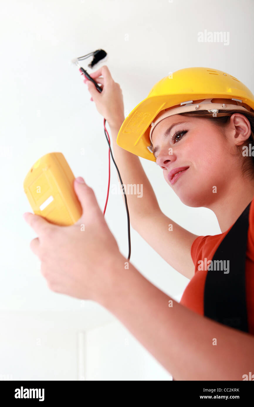 female electrician working Stock Photo - Alamy