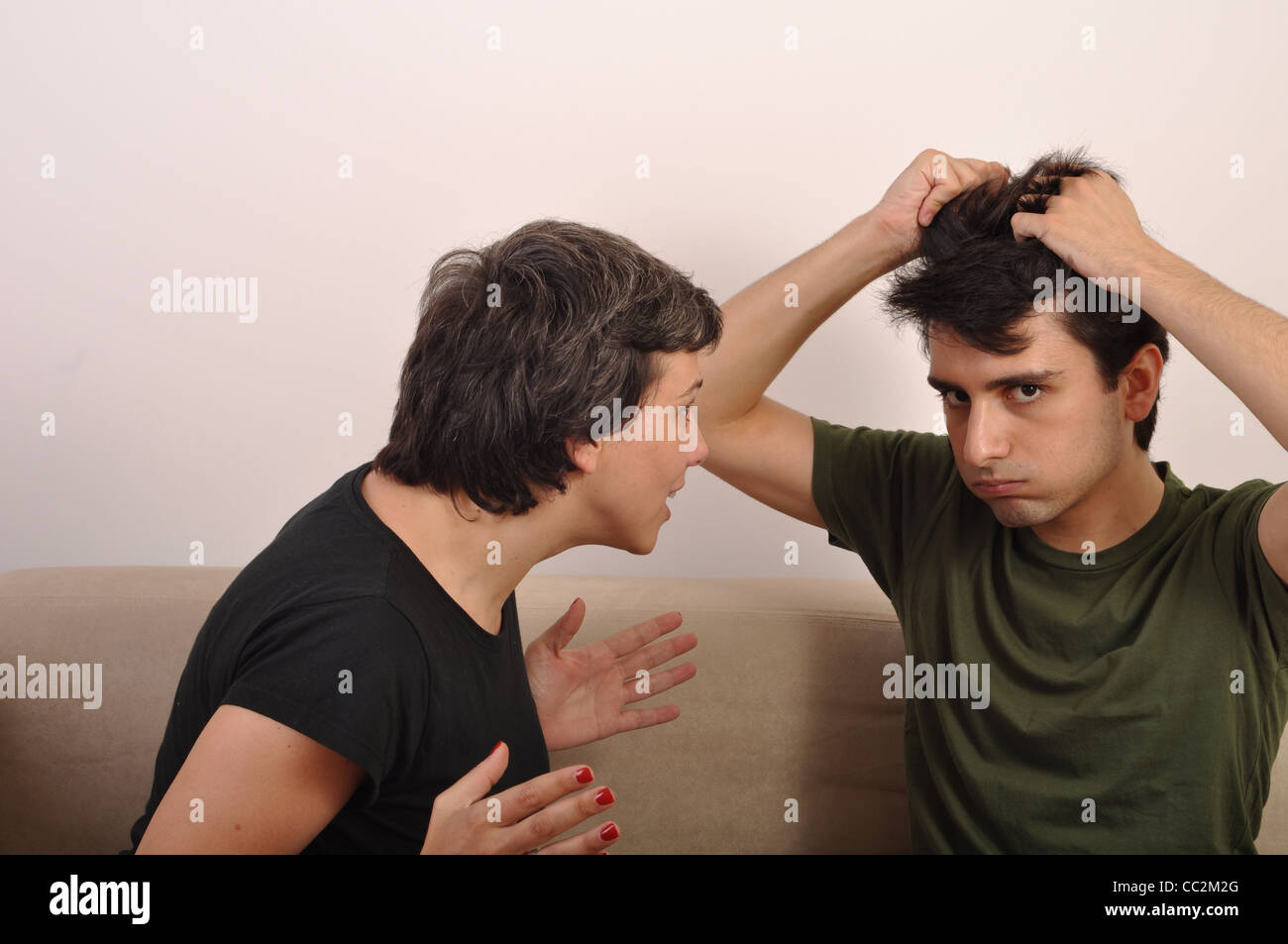 Woman and man yelling face to face Stock Photo - Alamy