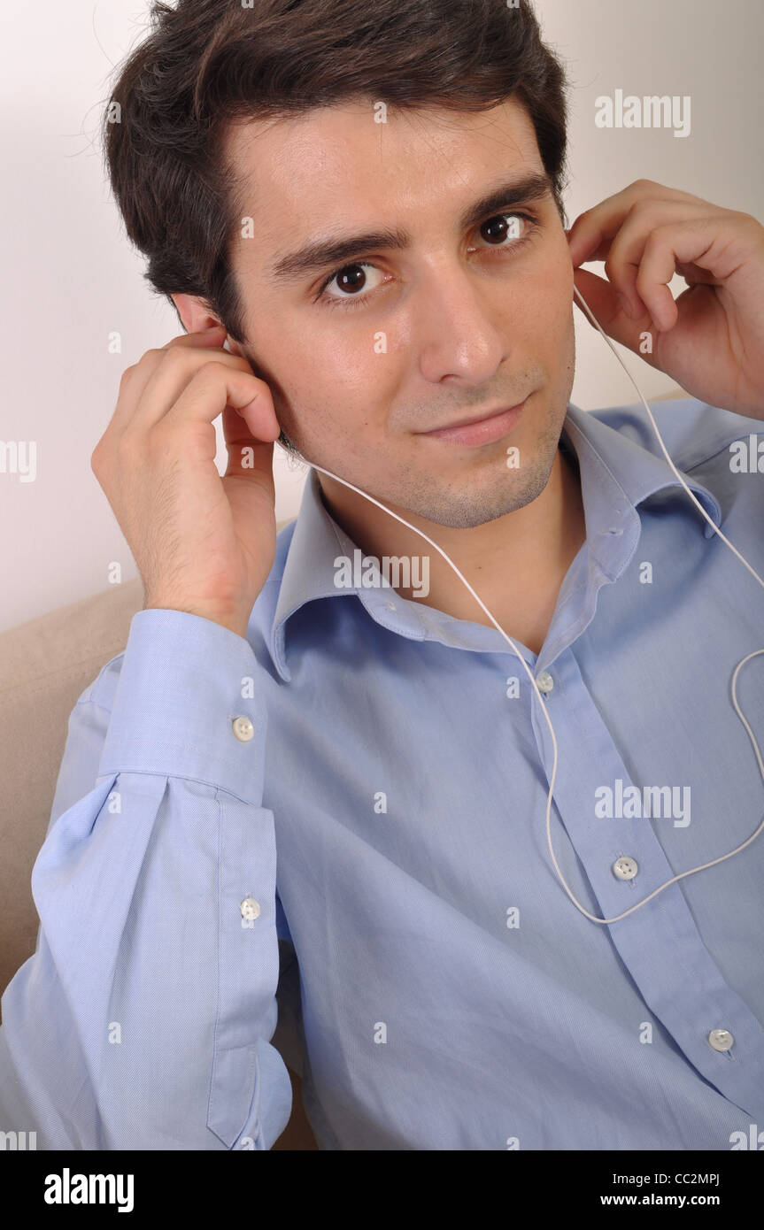 Man listening to music Stock Photo - Alamy