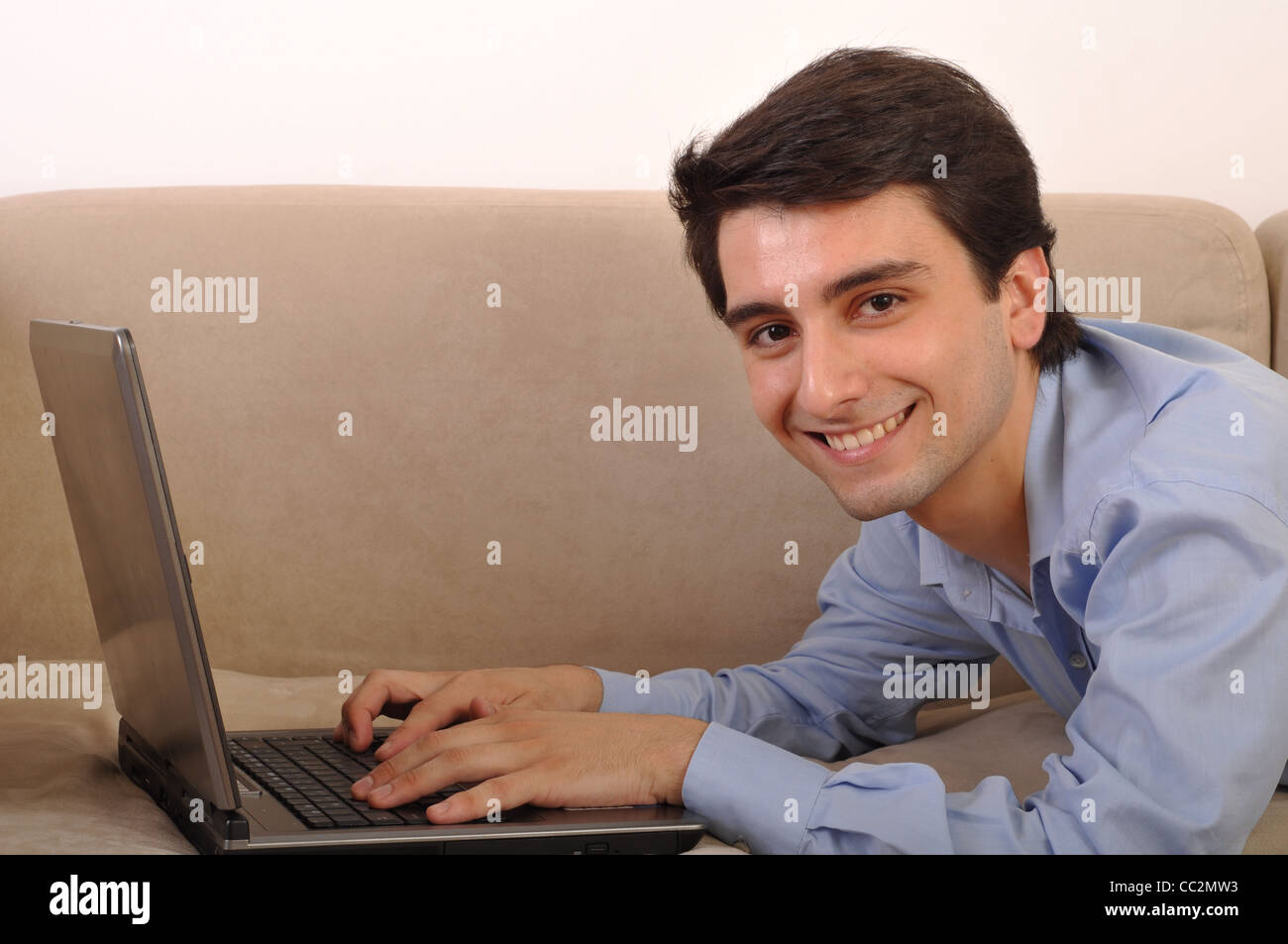 Man surfing the web Stock Photo - Alamy