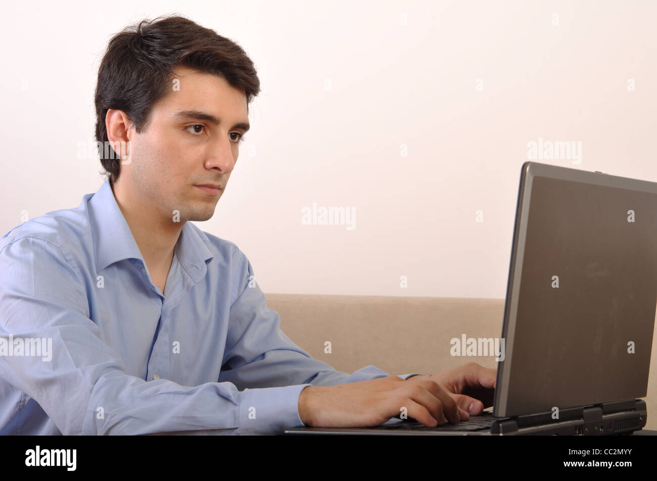 Man surfing the web Stock Photo - Alamy