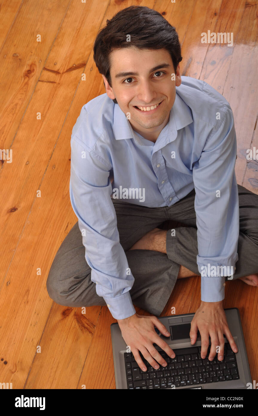 Man surfing the web Stock Photo - Alamy