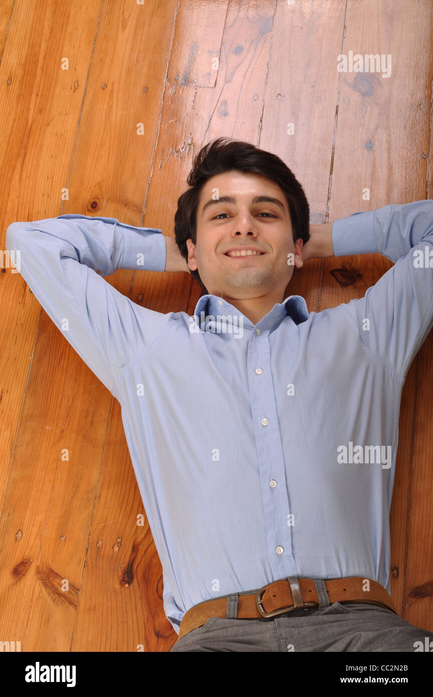 Man twenties lifestyle sitting lying hi-res stock photography and ...