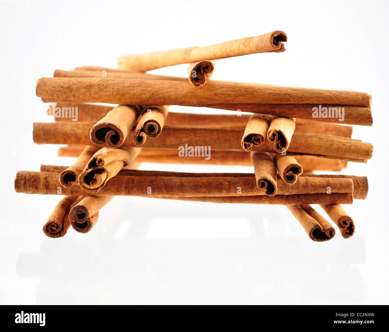 cinnamon sticks on white background Stock Photo - Alamy