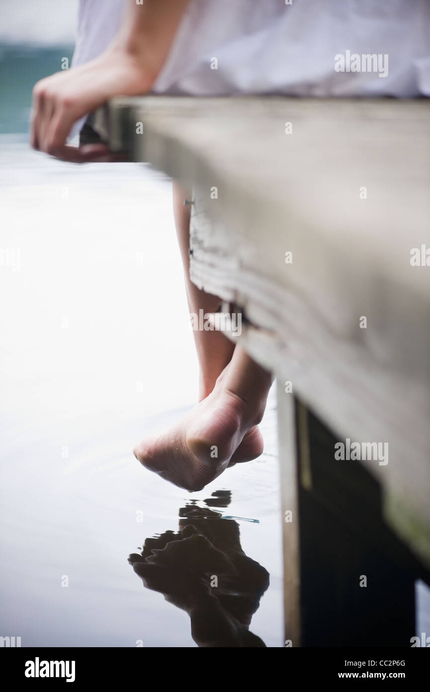 Feet on pier hi-res stock photography and images - Alamy
