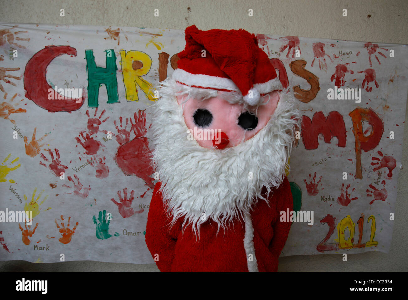 An Israeli Arab Christian wearing Santa Claus outfit posing during ...