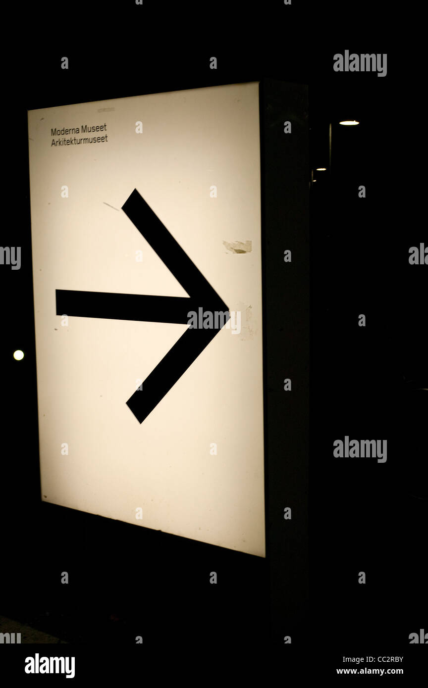 Arrow represented on a light panel ai night Stock Photo - Alamy