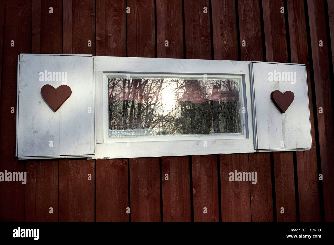 Window on little Swedish shed in garden Stock Photo - Alamy