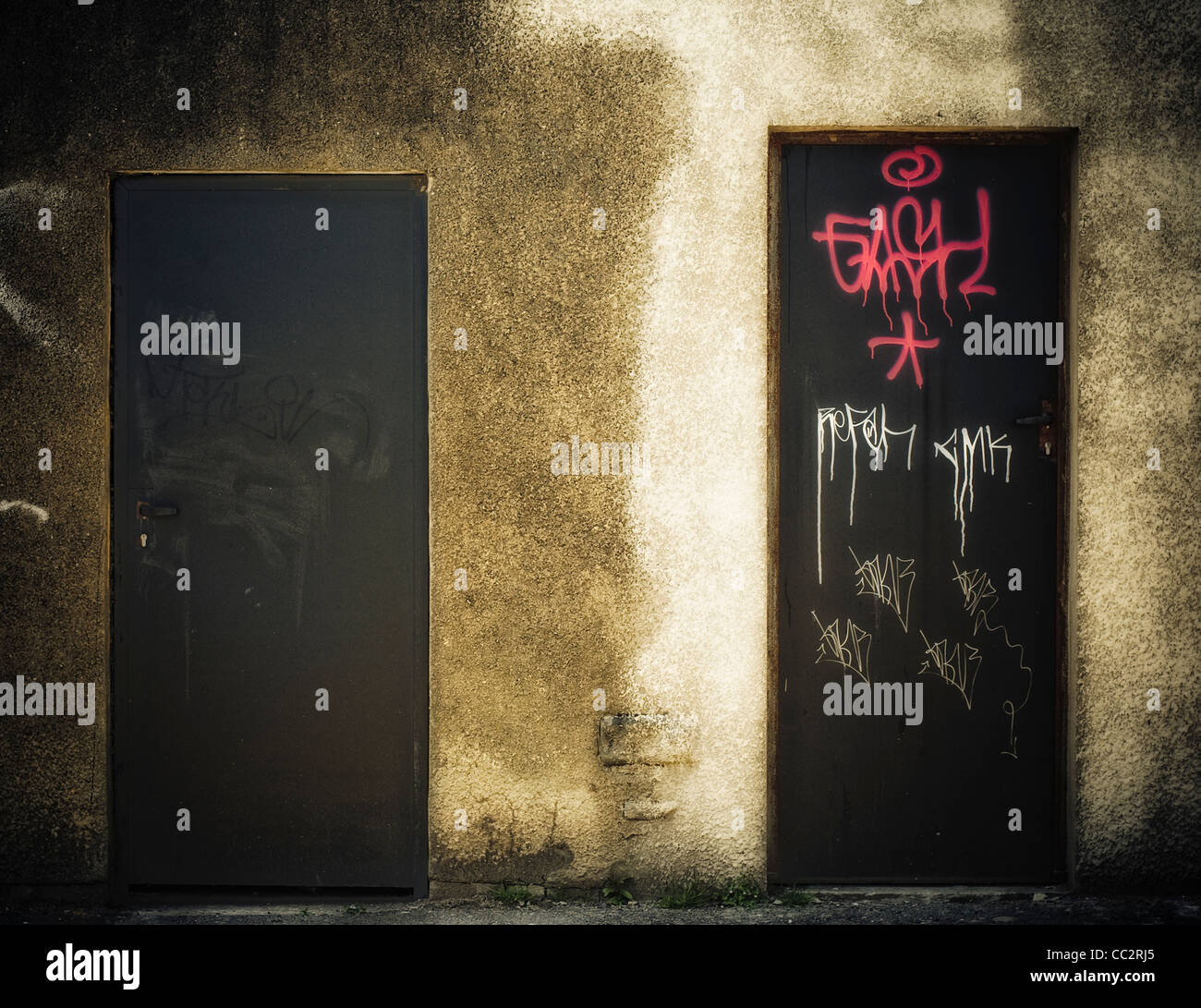 Derelict doors with graffiti Stock Photo - Alamy