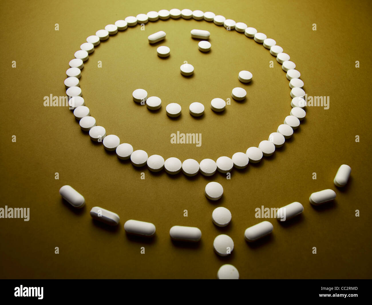 Happy contented face made out of pills and drugs Stock Photo - Alamy