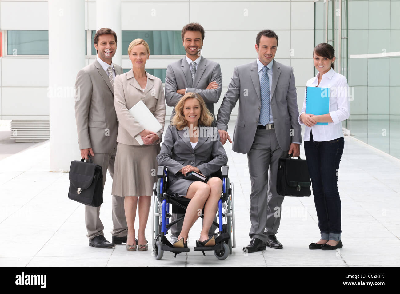 Business people stood outside building Stock Photo - Alamy