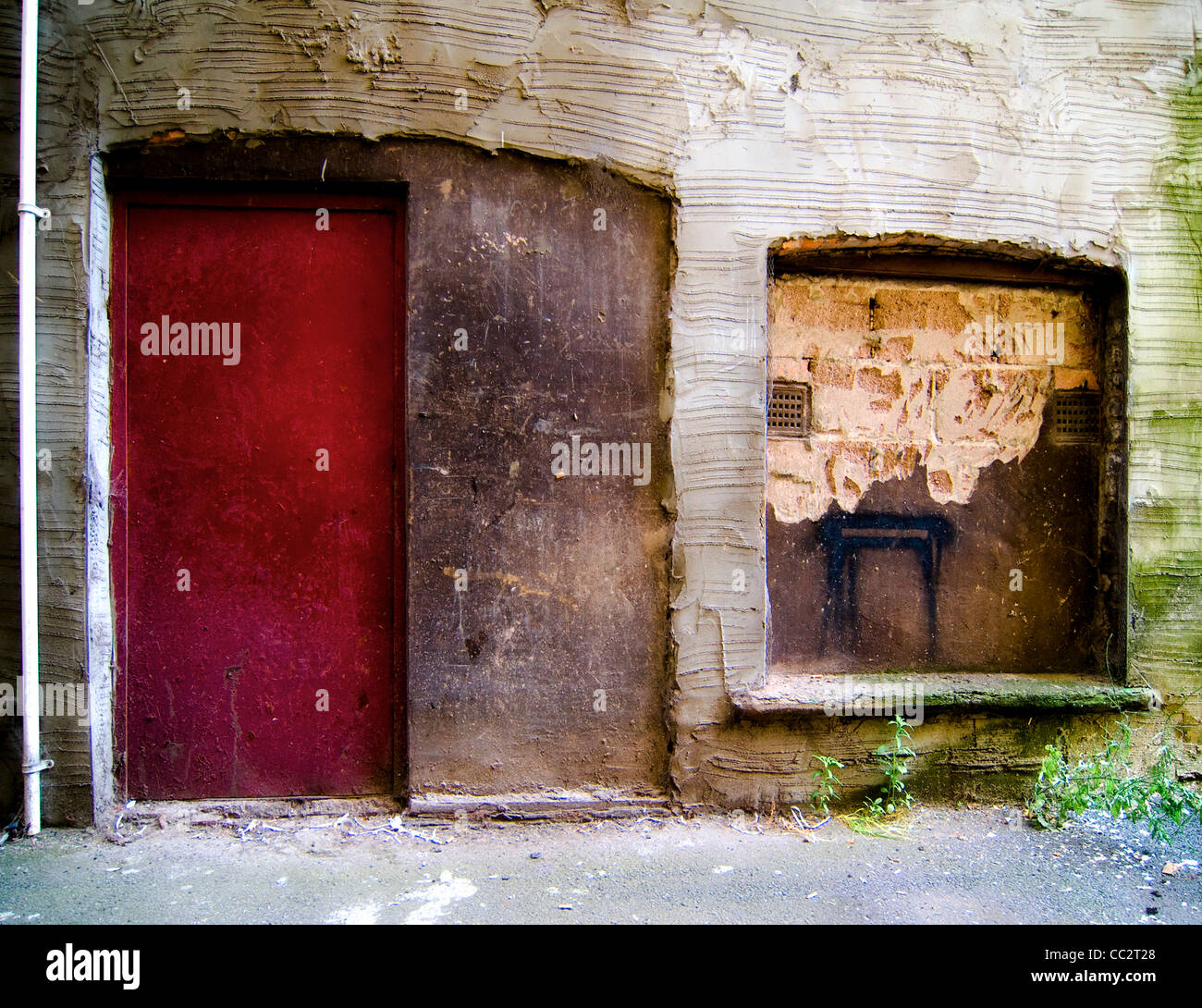 Derelict door and window with graffiti Stock Photo - Alamy