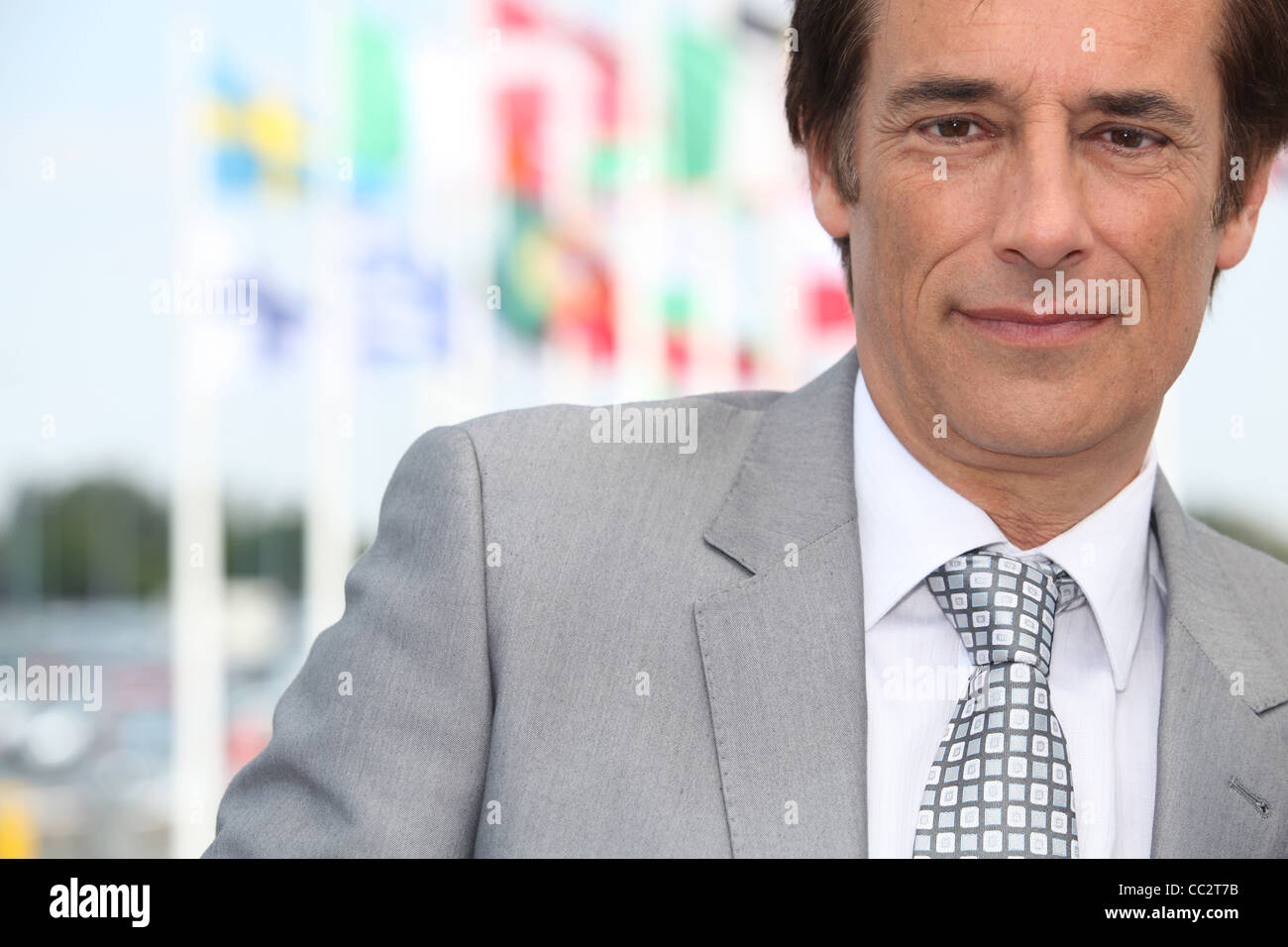 man with flags Stock Photo - Alamy
