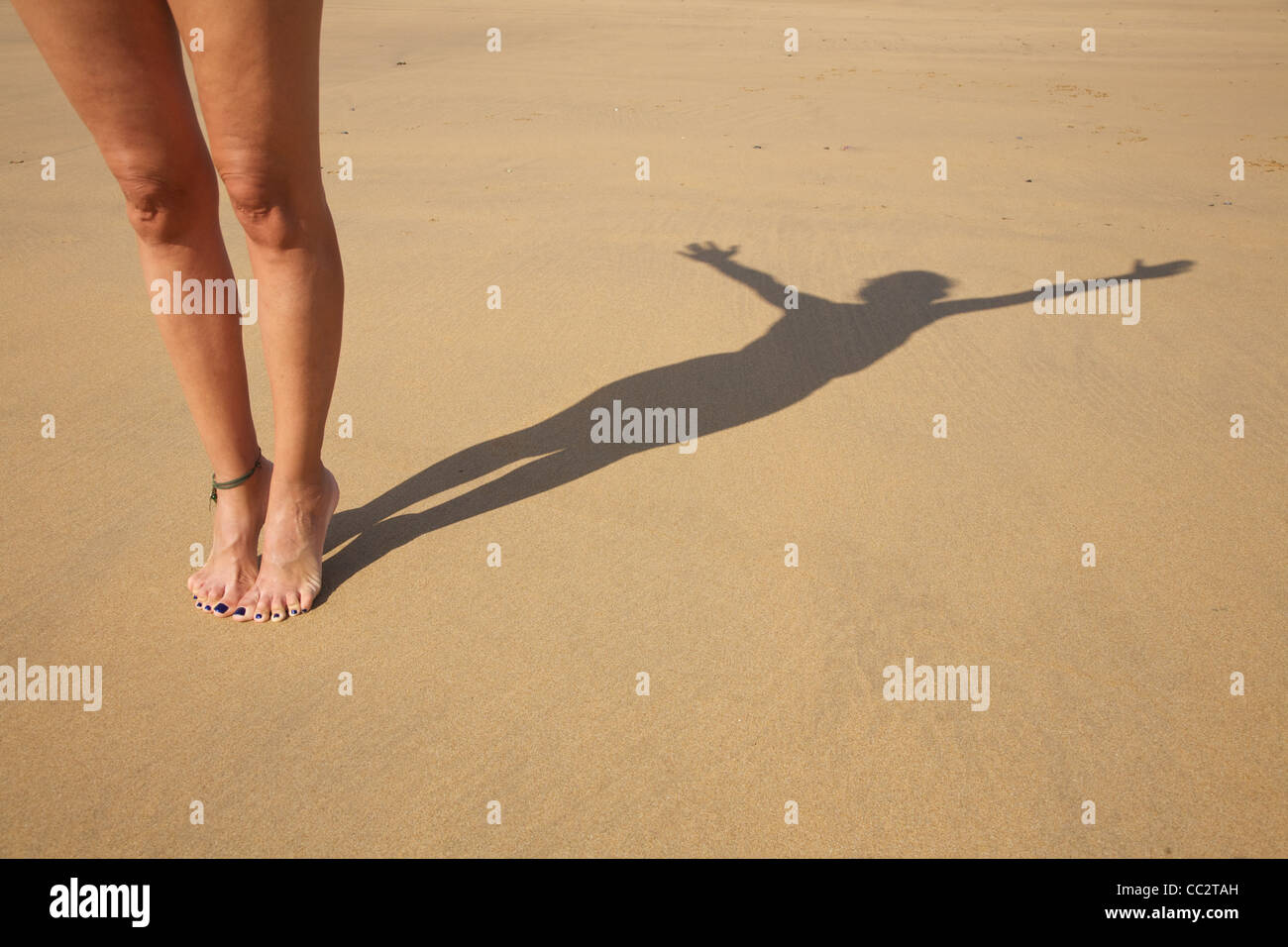 woman legs and shade with compass in a beach Stock Photo - Alamy