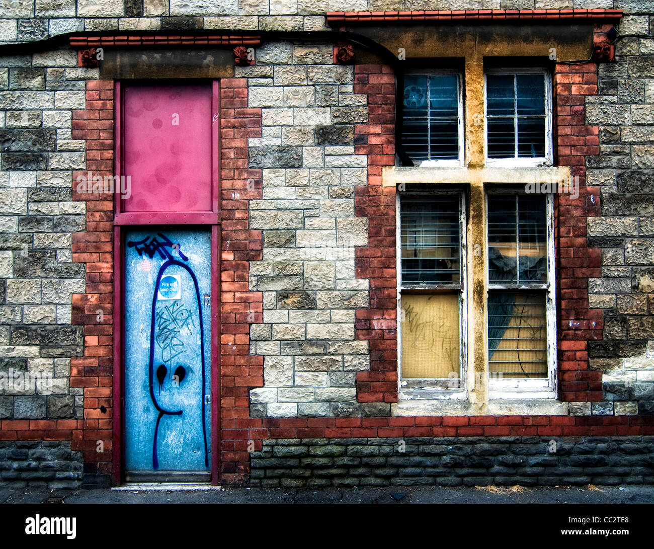 Derelict door and window with graffiti Stock Photo - Alamy