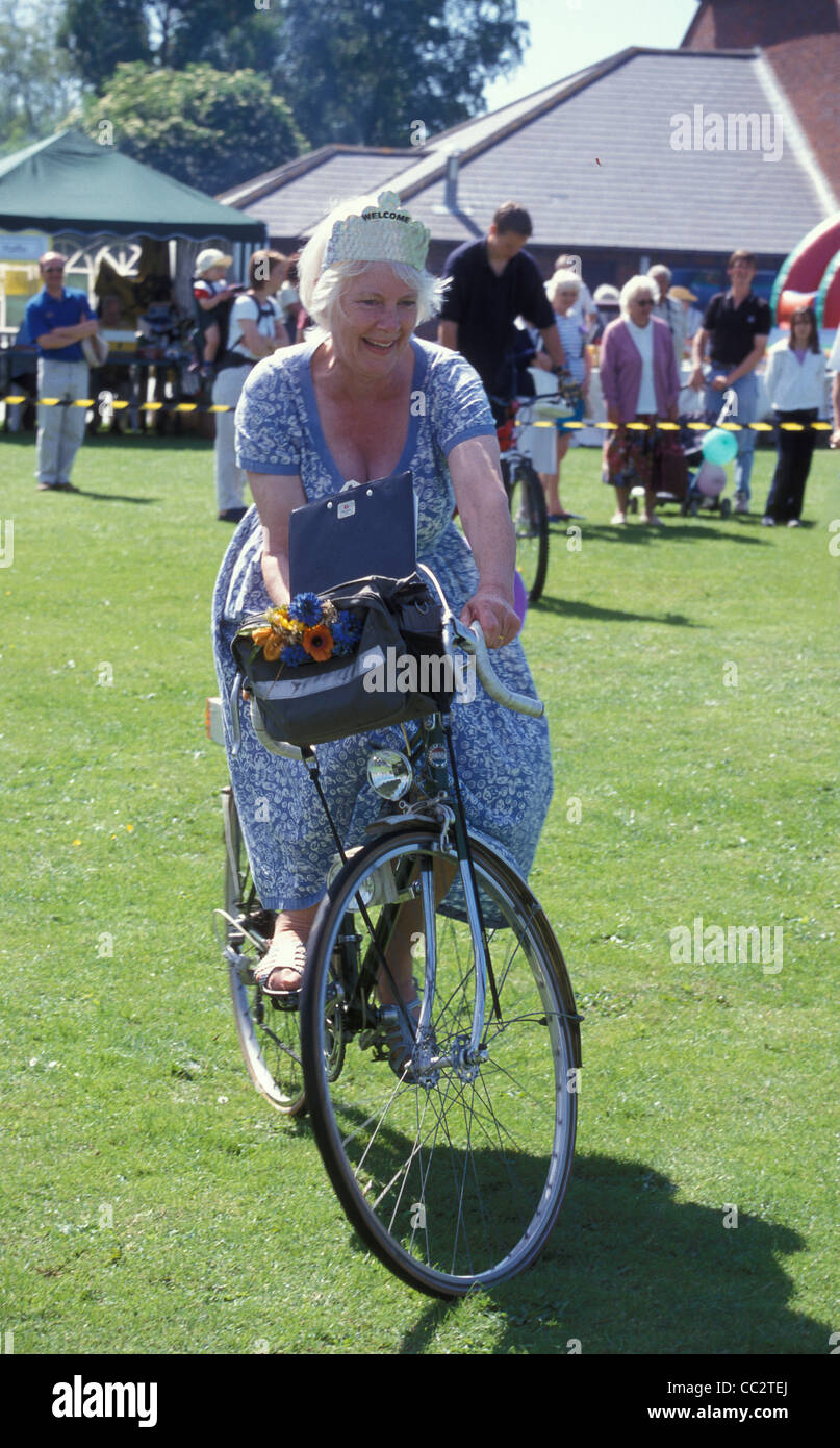 mature woman in cycle race at village fete Stock Photo - Alamy