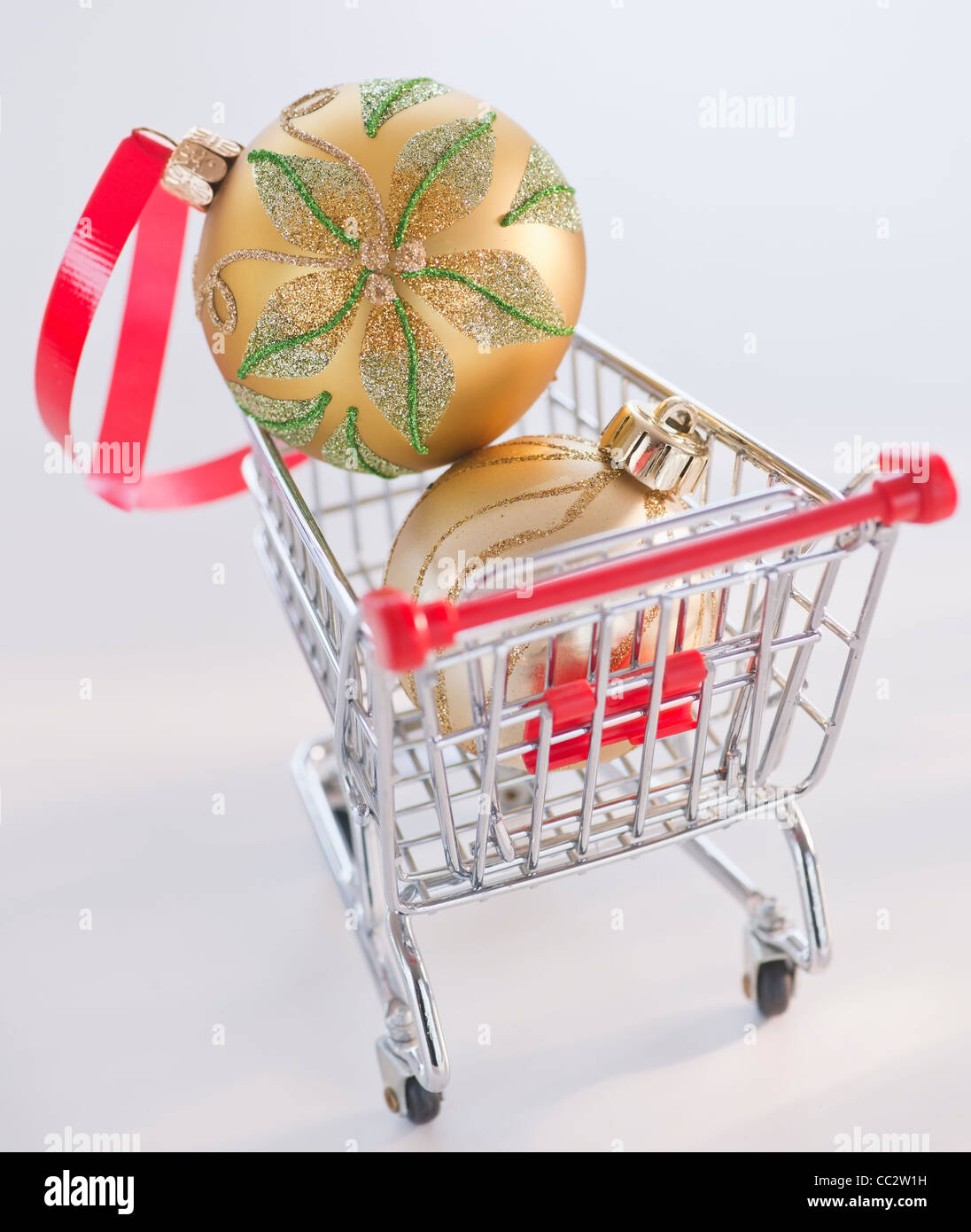 Shopping cart with christmas decorations Stock Photo - Alamy