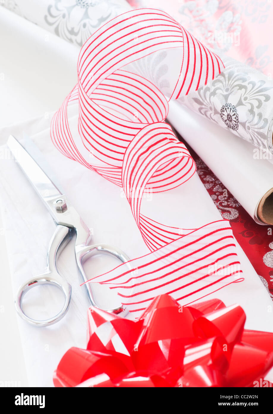 Wrapping paper, ribbon and scissors Stock Photo - Alamy