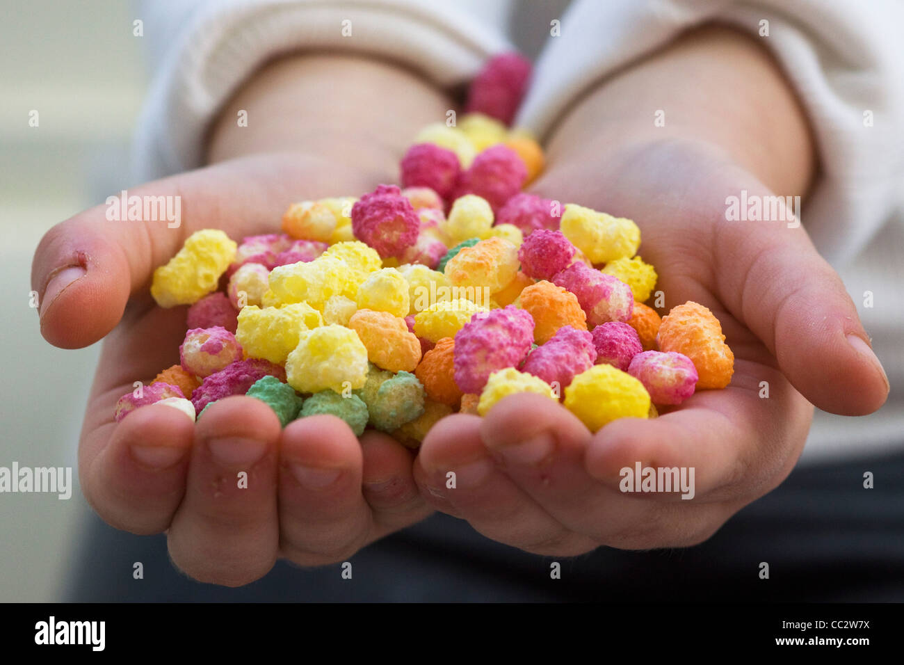 Childs hands holding candy hi-res stock photography and images - Alamy