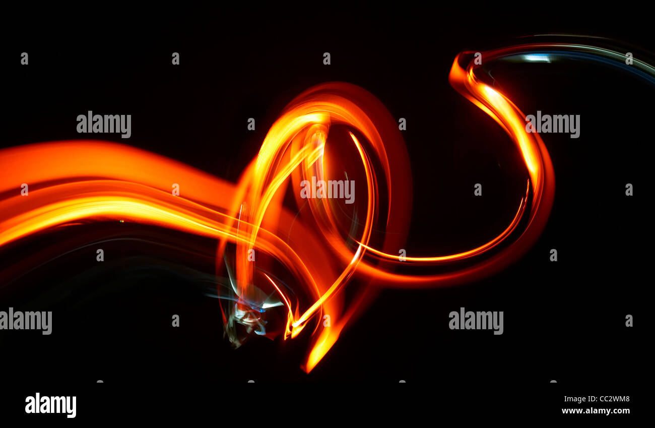 Abstract Orange Red Yellow Neon Light Swirls Stock Photo - Alamy