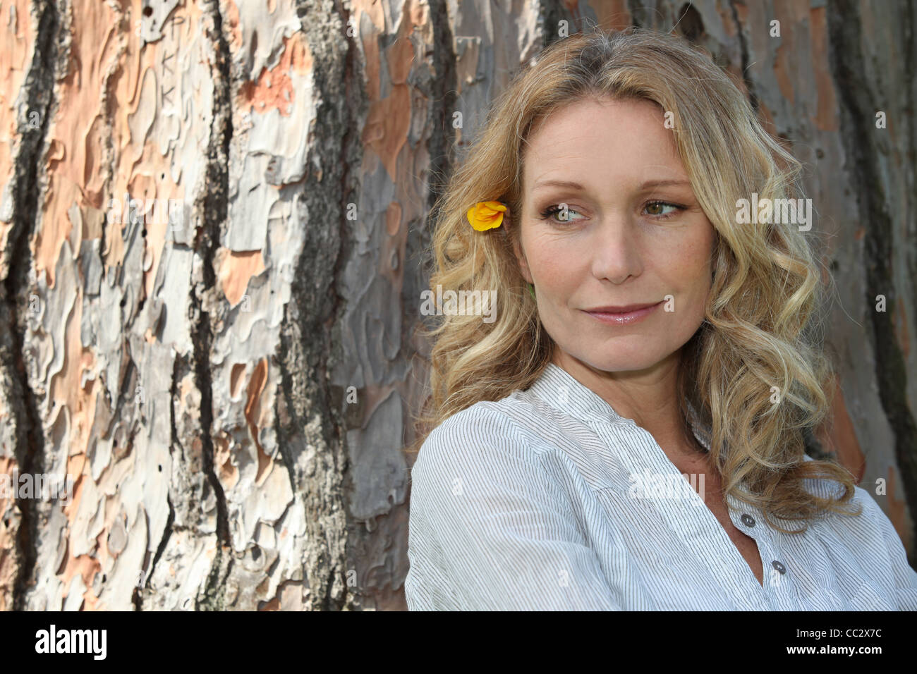 Sat sitting under tree hi-res stock photography and images - Alamy