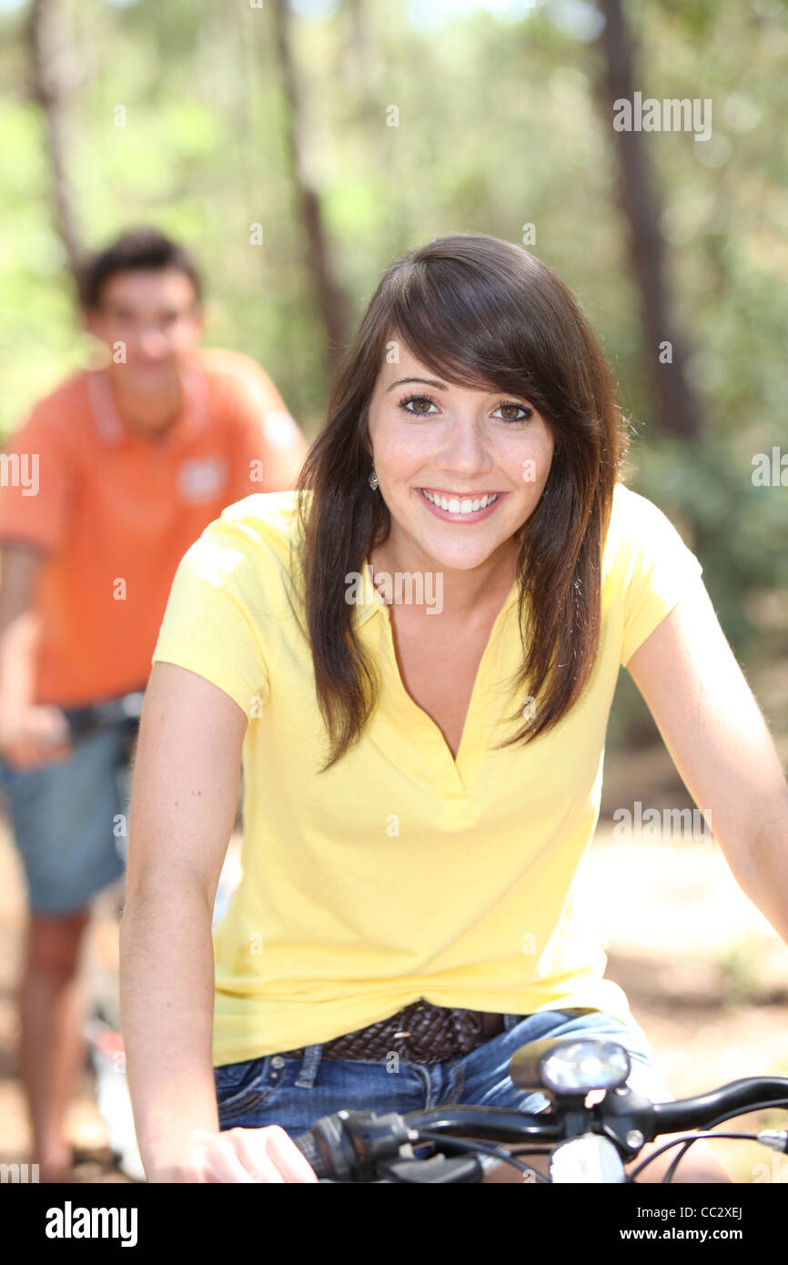 young people riding bikes Stock Photo - Alamy