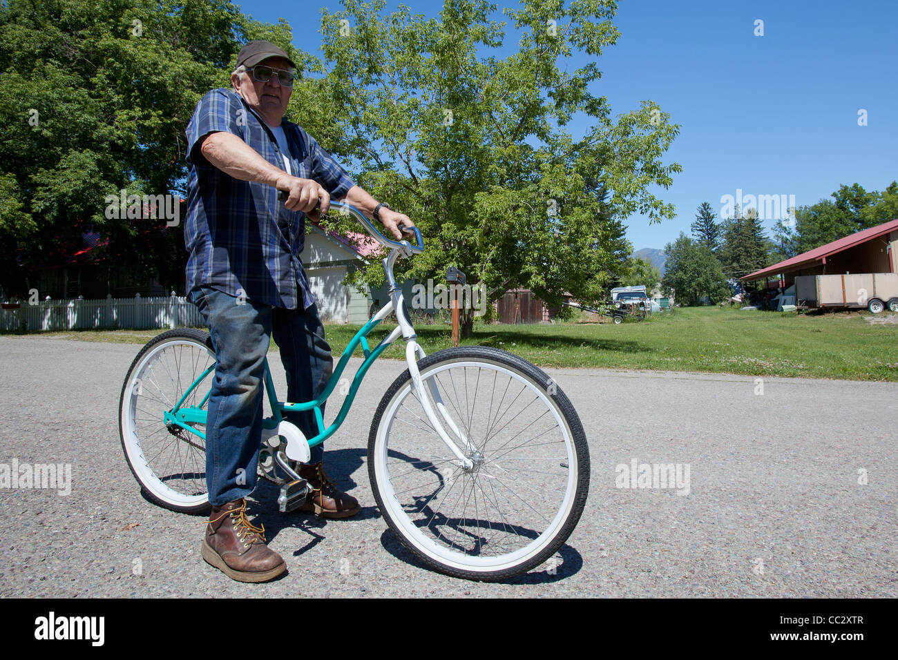 USA, Montana, Whitefish, Portrait of senior man on bike Stock Photo - Alamy