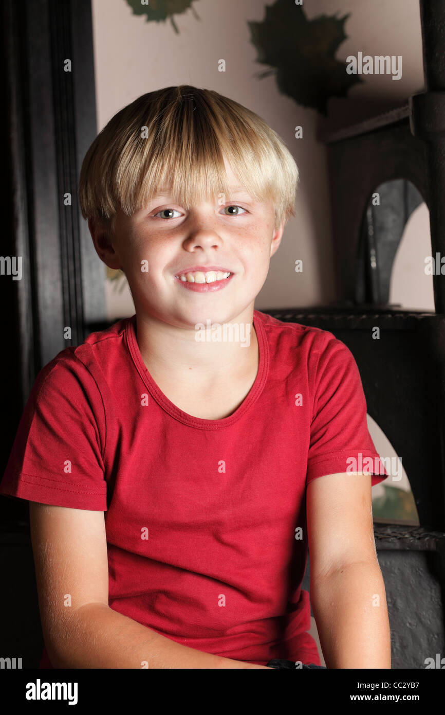 blonde boy in red Stock Photo - Alamy
