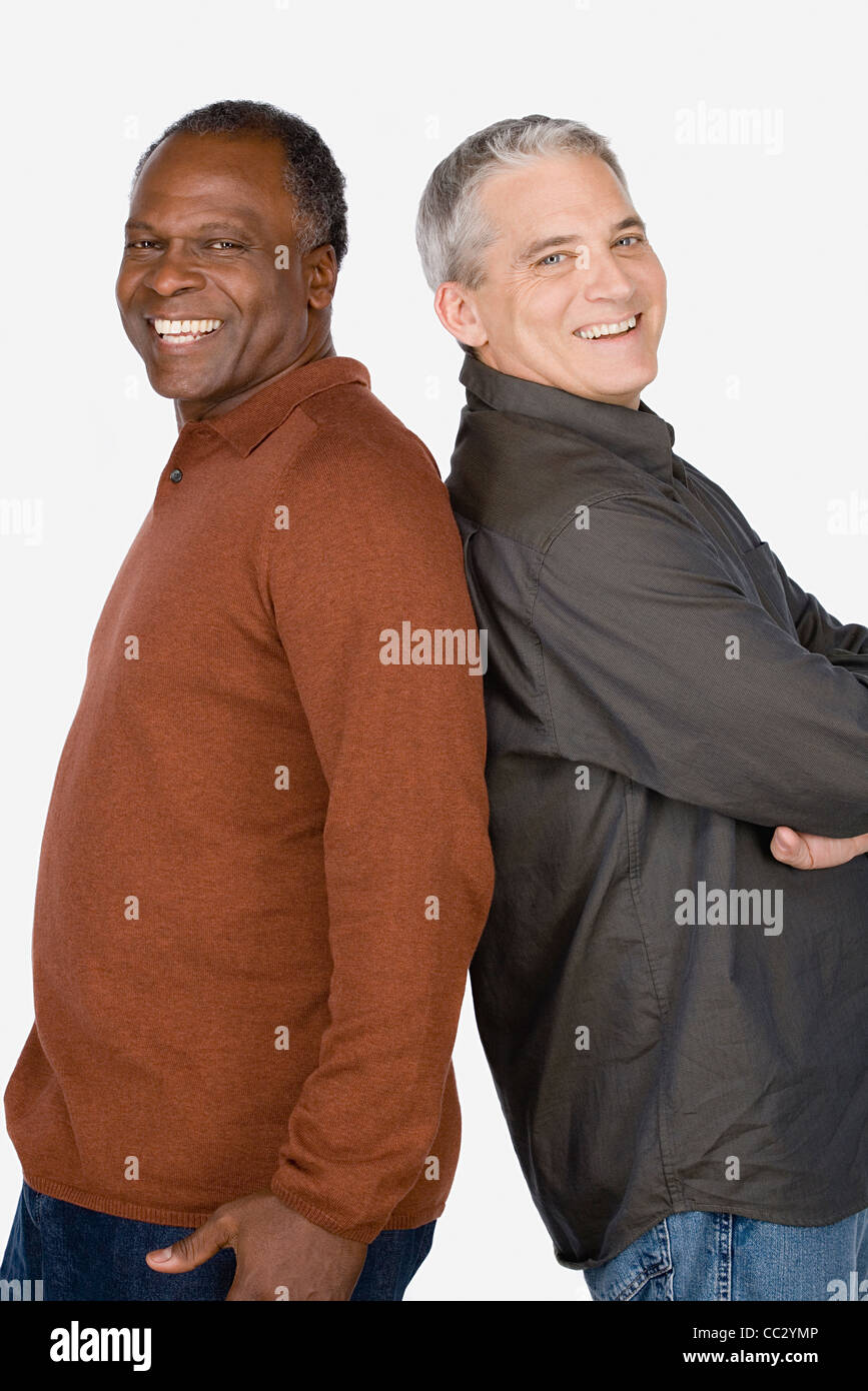Studio portrait of two mature men Stock Photo - Alamy