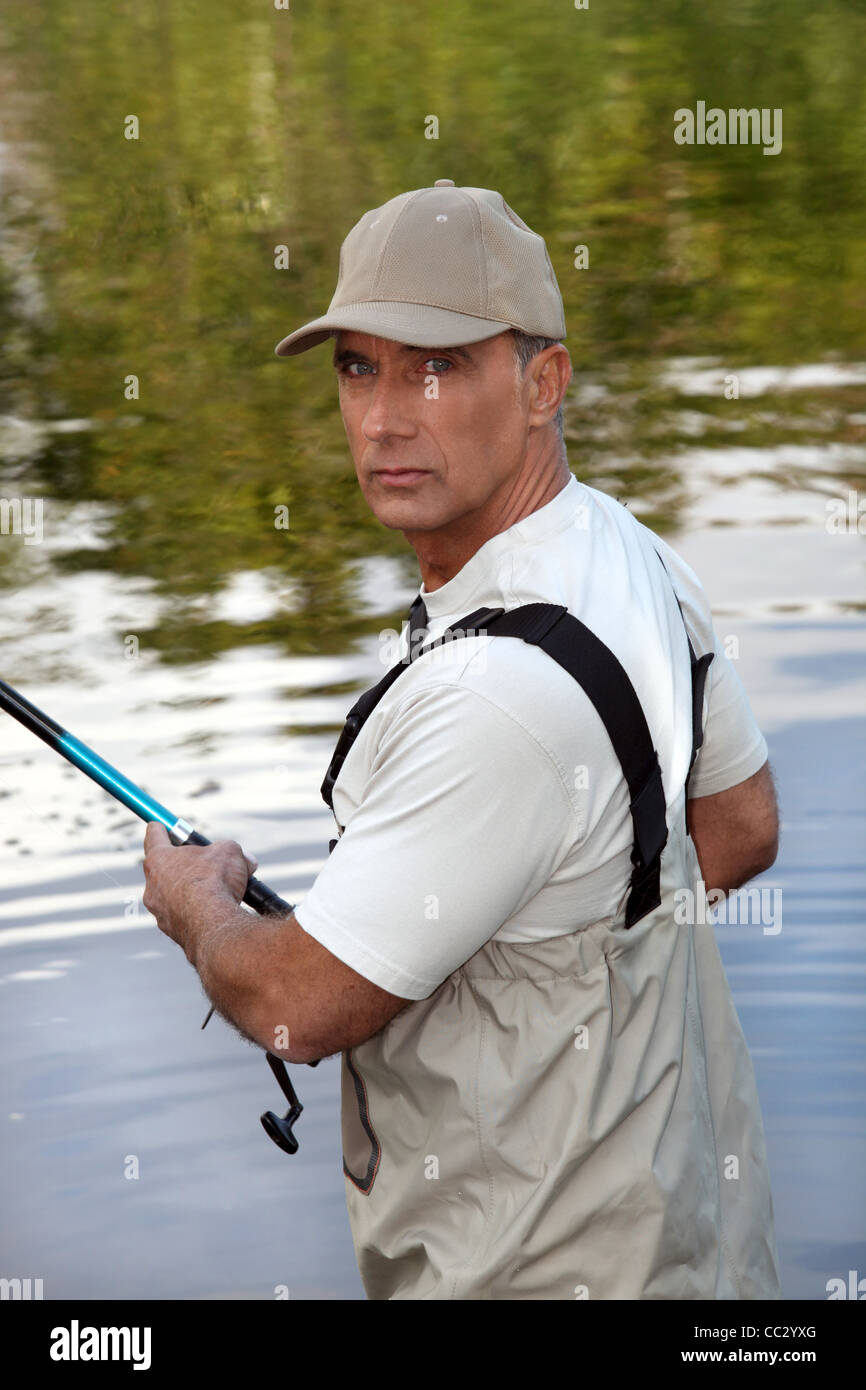 Fisherman wearing cap hi-res stock photography and images - Alamy