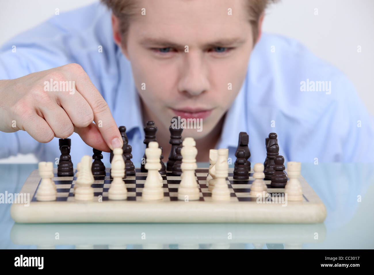 Man playing chess Stock Photo - Alamy