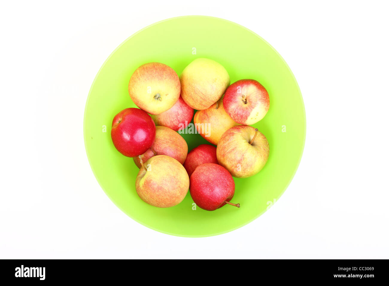 Fresh green, red apples in basket isolated over white background Stock ...