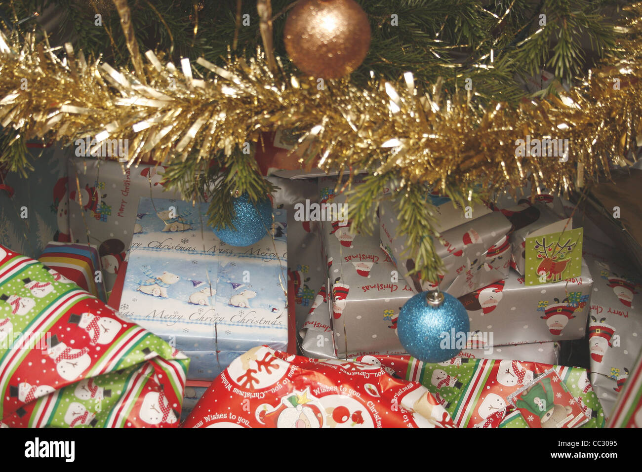 presents under christmas tree Stock Photo - Alamy