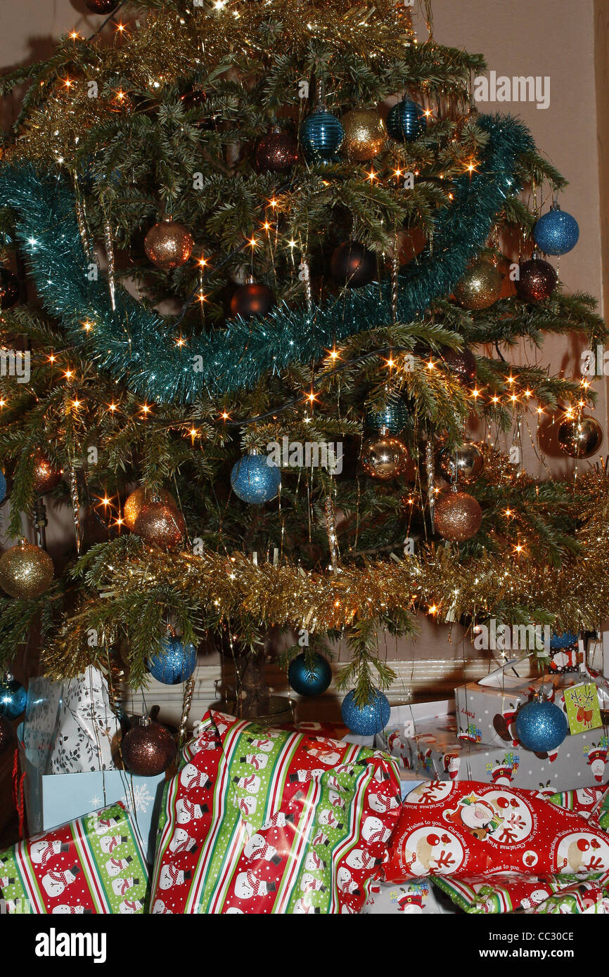 presents under christmas tree Stock Photo - Alamy