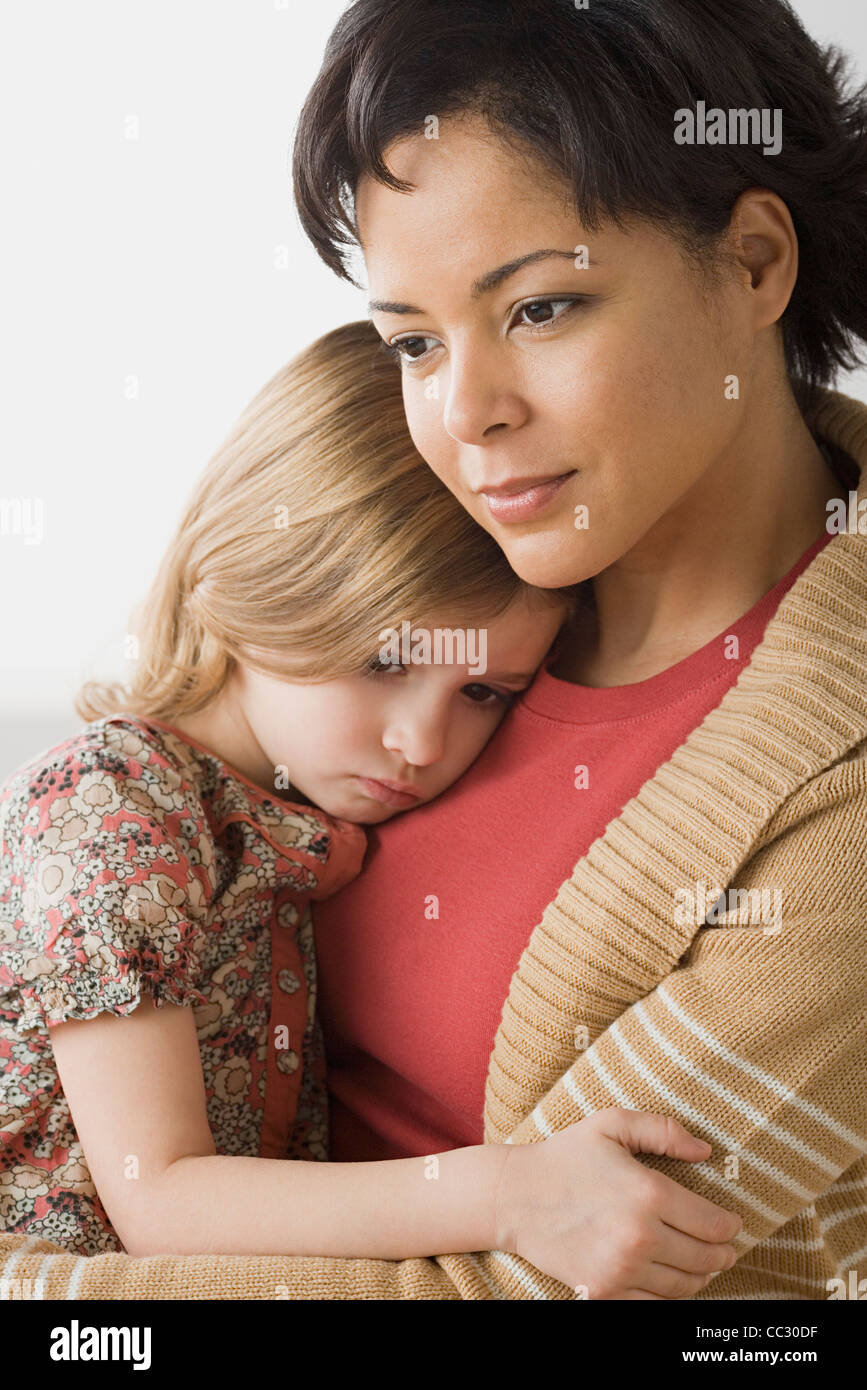 USA, California, Los Angeles, Teacher comforting girl (6-7 Stock Photo ...