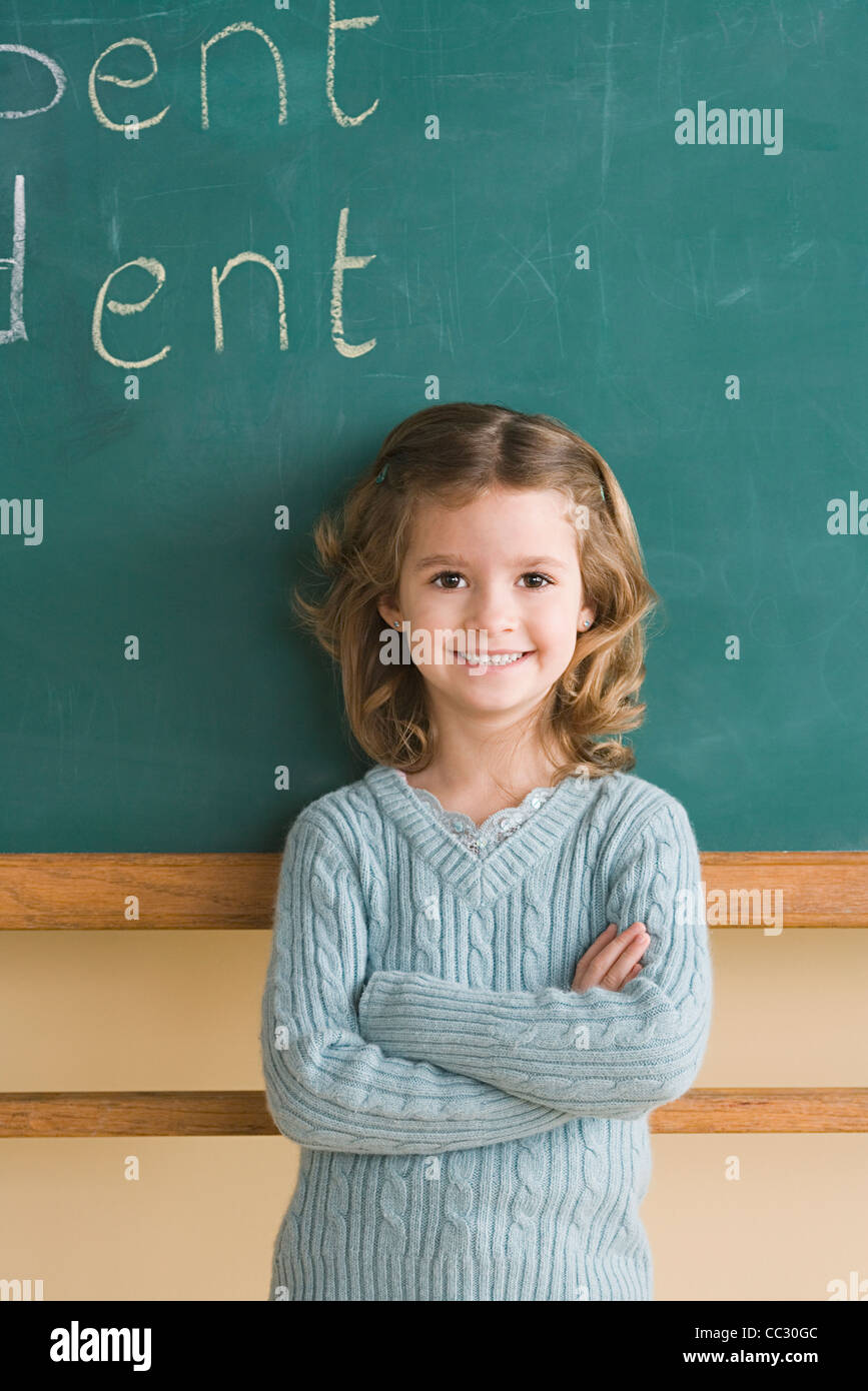 USA, California, Los Angeles, Girl (6-7) in classroom against ...