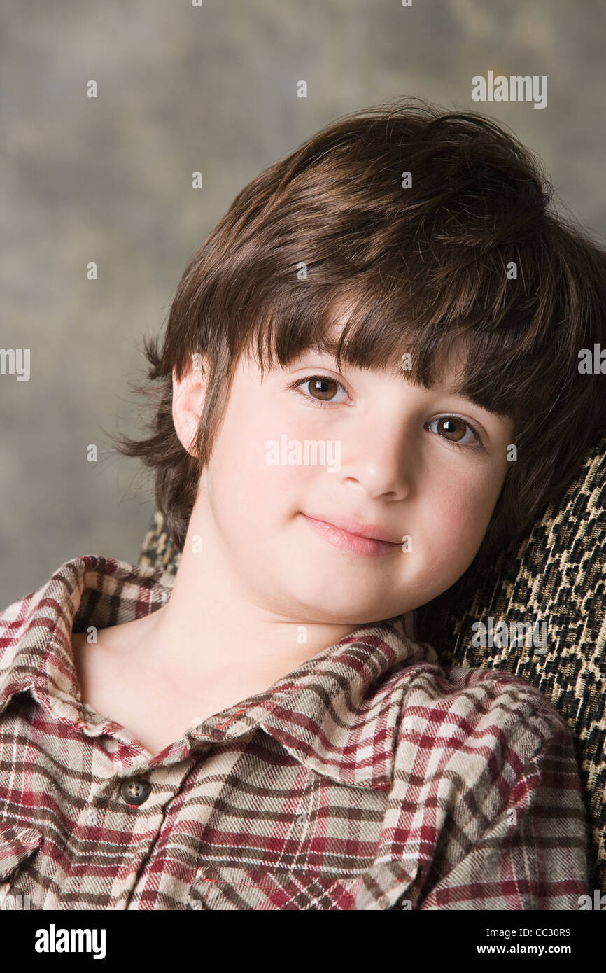 Portrait of smiling (6-7) boy, studio shot Stock Photo - Alamy