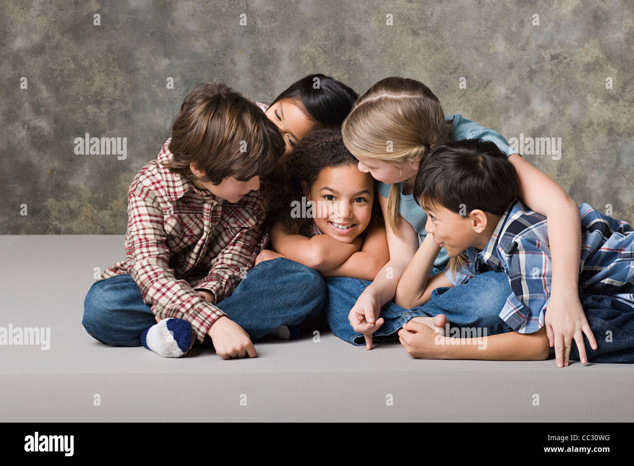 Children (6-7, 8-9) playing together, studio shot Stock Photo - Alamy