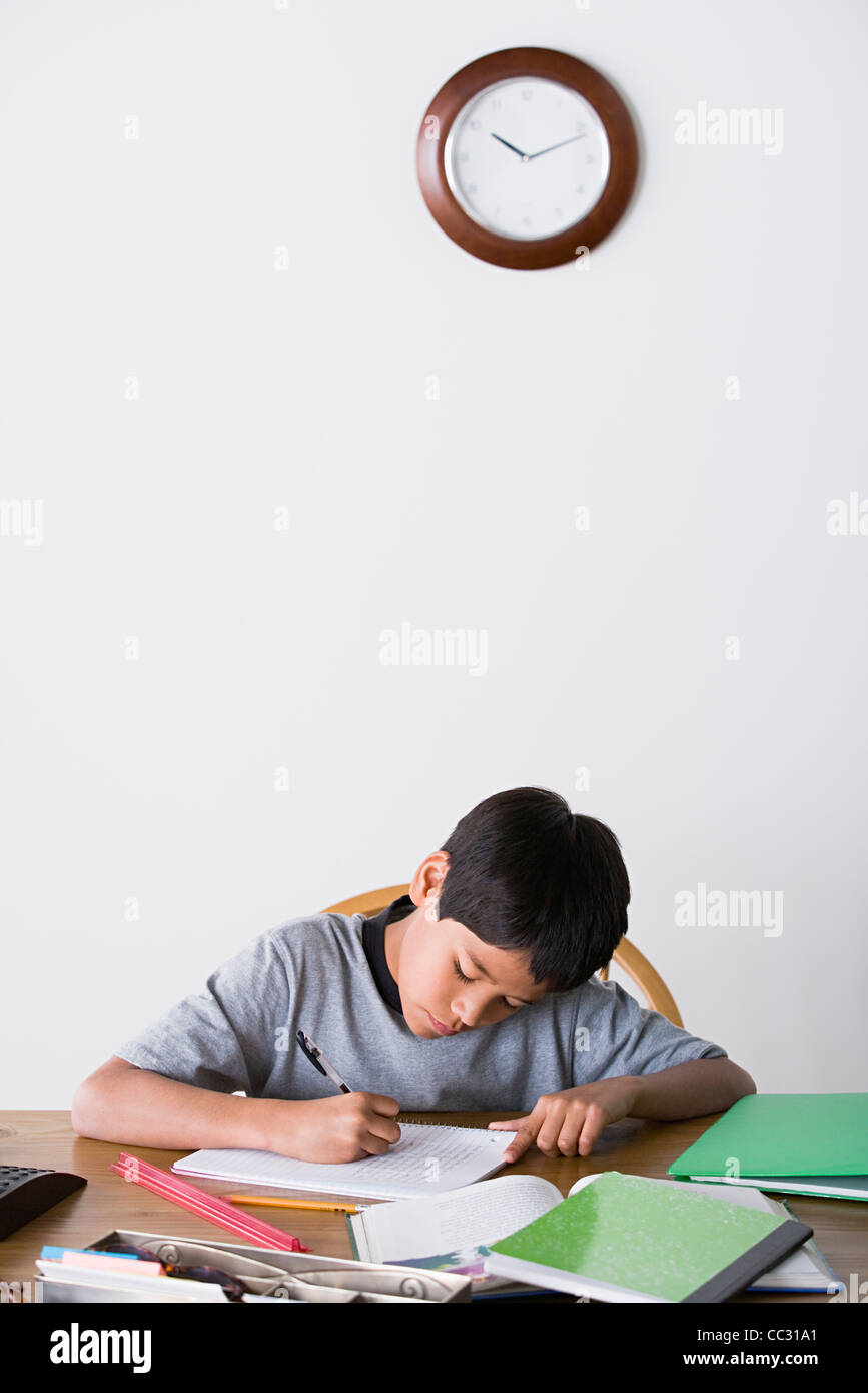 Close up boy doing homework hi-res stock photography and images - Alamy