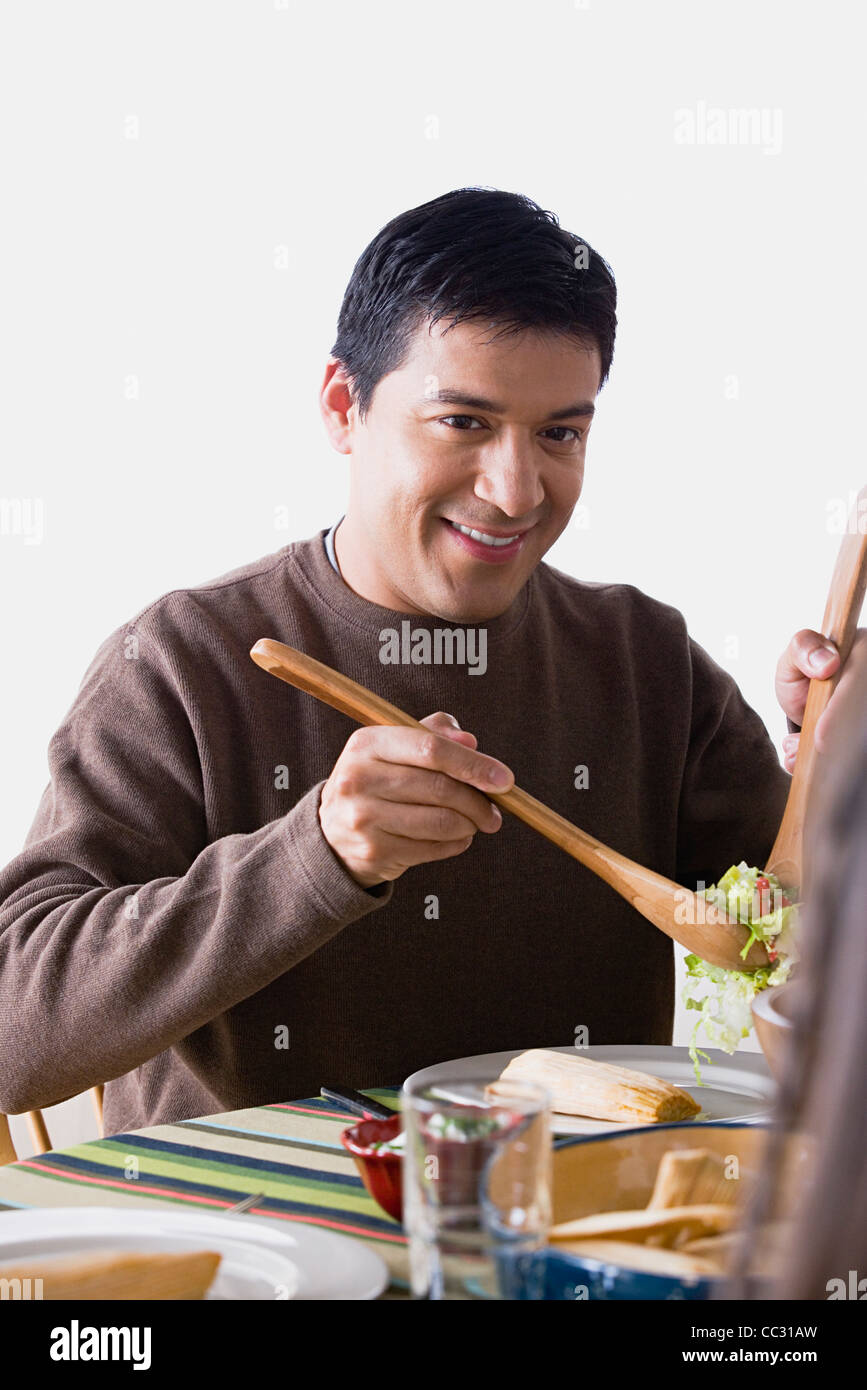 USA, California, Los Angeles, Smiling man dining at table Stock Photo ...